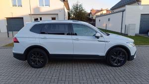 White Volkswagen Tiguan 2024 in Klaipeda, with an engine capacity of 2.00 L and mileage of 12 thousand km for 24900 €, photo 4 on AUTOMOTO.COM.LV
