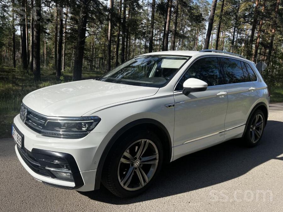 White Volkswagen Tiguan 2018 in Riga, with an engine capacity of 2.00 L and mileage of 213 thousand km for 17900 €, photo 6 on AUTOMOTO.COM.LV