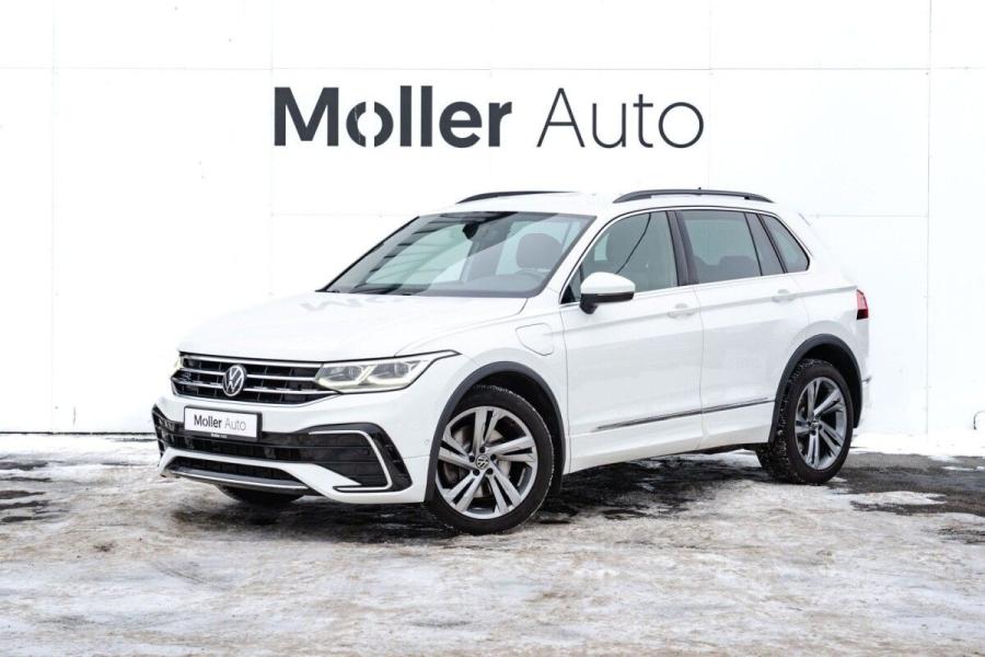 White Volkswagen Tiguan 2021 in Riga, with an engine capacity of 1.40 L and mileage of 126 thousand km for 28650 €, photo 1 on AUTOMOTO.COM.LV