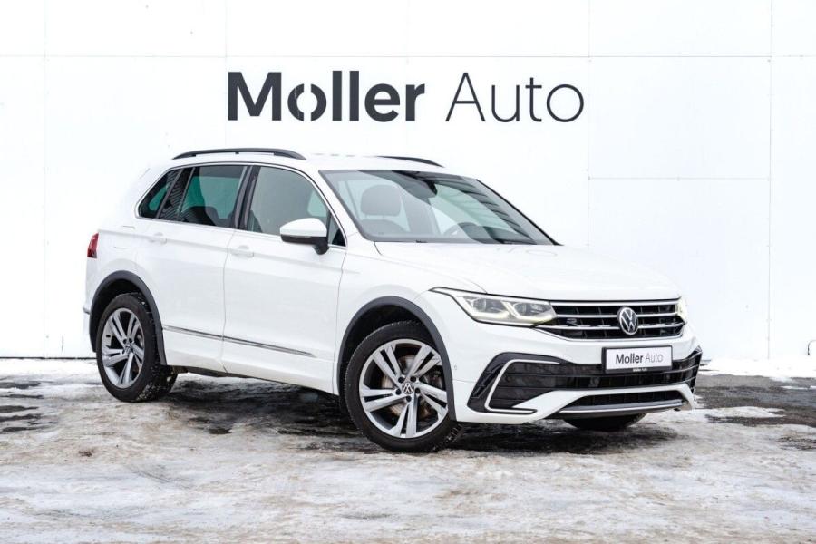 White Volkswagen Tiguan 2021 in Riga, with an engine capacity of 1.40 L and mileage of 126 thousand km for 28650 €, photo 2 on AUTOMOTO.COM.LV