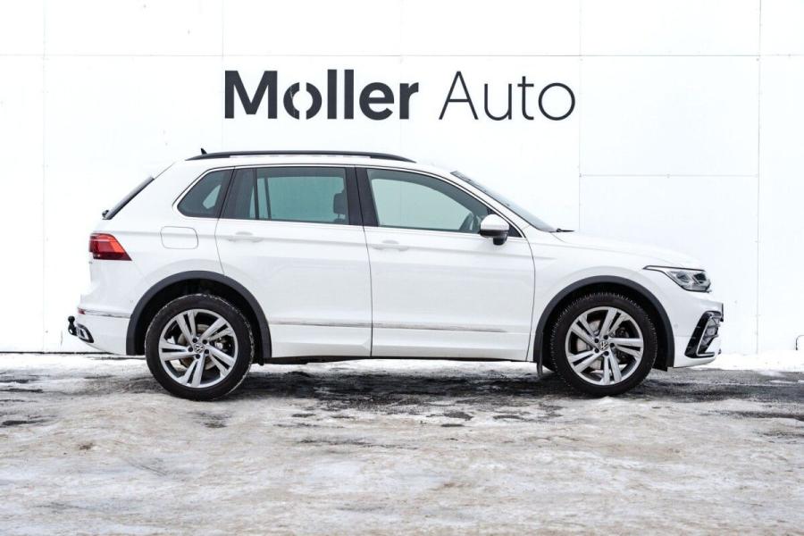 White Volkswagen Tiguan 2021 in Riga, with an engine capacity of 1.40 L and mileage of 126 thousand km for 28650 €, photo 5 on AUTOMOTO.COM.LV