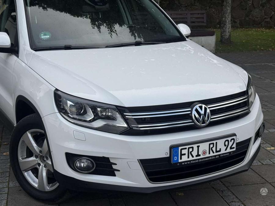 White Volkswagen Tiguan 2012 in Kaunas, with an engine capacity of 1.40 L and mileage of 207 thousand km for 6700 €, photo 4 on AUTOMOTO.COM.LV