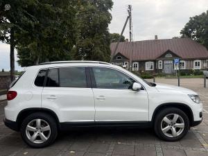 White Volkswagen Tiguan 2012 in Kaunas, with an engine capacity of 1.40 L and mileage of 207 thousand km for 6700 €, photo 8 on AUTOMOTO.COM.LV