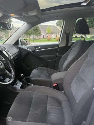 White Volkswagen Tiguan 2012 in Kaunas, with an engine capacity of 1.40 L and mileage of 207 thousand km for 6700 €, photo 24 on AUTOMOTO.COM.LV