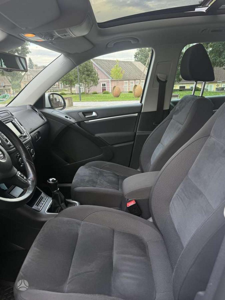 White Volkswagen Tiguan 2012 in Kaunas, with an engine capacity of 1.40 L and mileage of 207 thousand km for 6700 €, photo 24 on AUTOMOTO.COM.LV