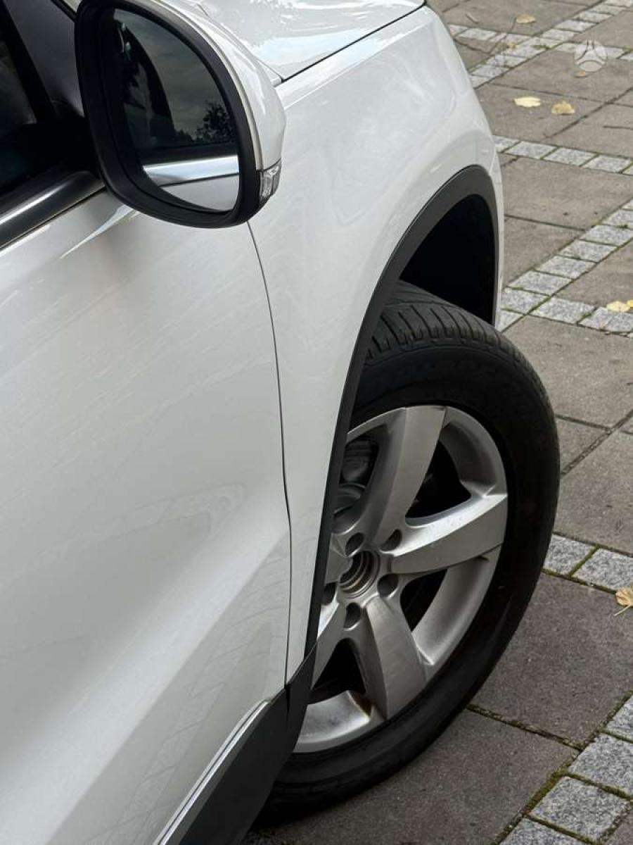 White Volkswagen Tiguan 2012 in Kaunas, with an engine capacity of 1.40 L and mileage of 207 thousand km for 6700 €, photo 33 on AUTOMOTO.COM.LV