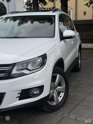 White Volkswagen Tiguan 2012 in Kaunas, with an engine capacity of 1.40 L and mileage of 207 thousand km for 6700 €, photo 34 on AUTOMOTO.COM.LV