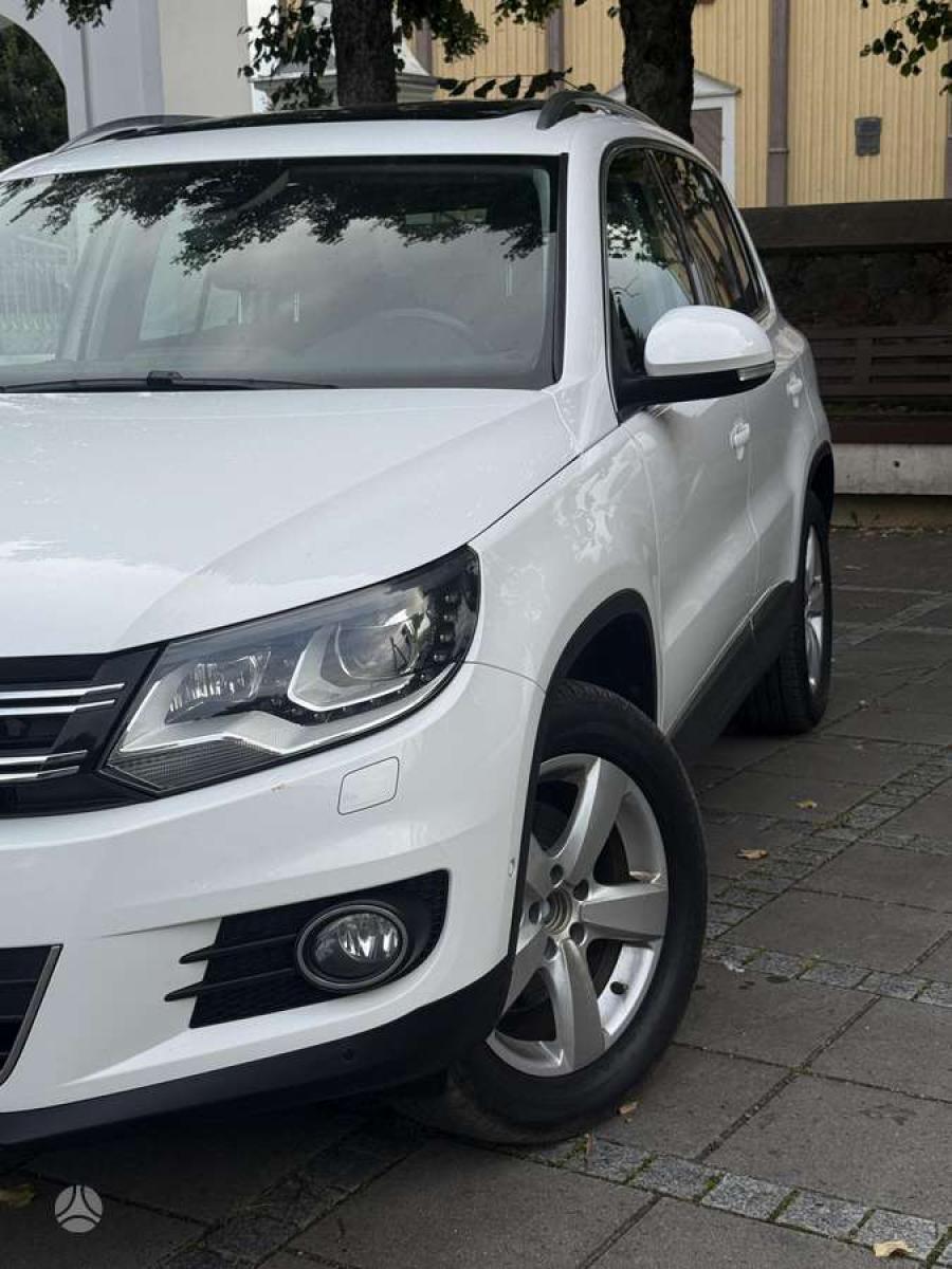 White Volkswagen Tiguan 2012 in Kaunas, with an engine capacity of 1.40 L and mileage of 207 thousand km for 6700 €, photo 34 on AUTOMOTO.COM.LV