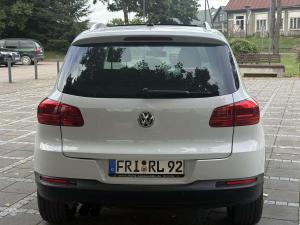 White Volkswagen Tiguan 2012 in Kaunas, with an engine capacity of 1.40 L and mileage of 207 thousand km for 6700 €, photo 37 on AUTOMOTO.COM.LV
