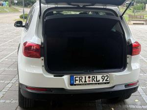 White Volkswagen Tiguan 2012 in Kaunas, with an engine capacity of 1.40 L and mileage of 207 thousand km for 6700 €, photo 38 on AUTOMOTO.COM.LV