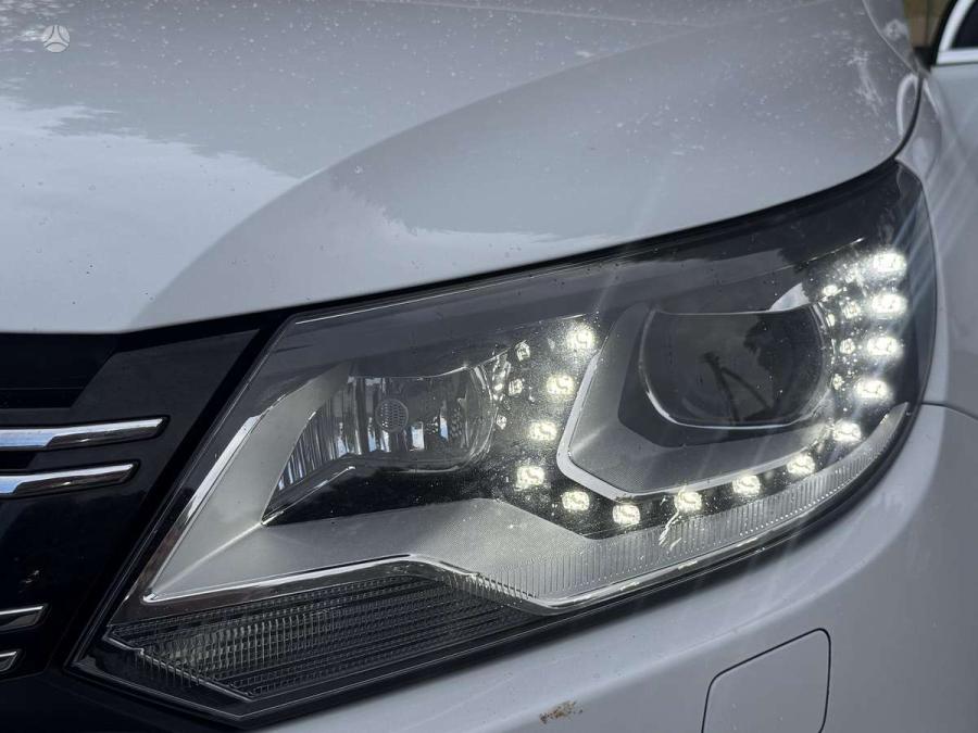 White Volkswagen Tiguan 2012 in Kaunas, with an engine capacity of 1.40 L and mileage of 207 thousand km for 6700 €, photo 45 on AUTOMOTO.COM.LV