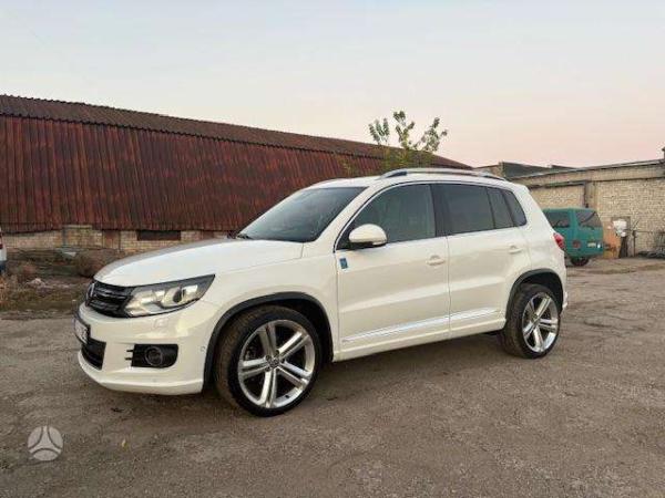 White Volkswagen Tiguan 2013 in Kaunas, with an engine capacity of 1.40 L and mileage of 290 thousand km for 6800 €, photo 1 on AUTOMOTO.COM.LV