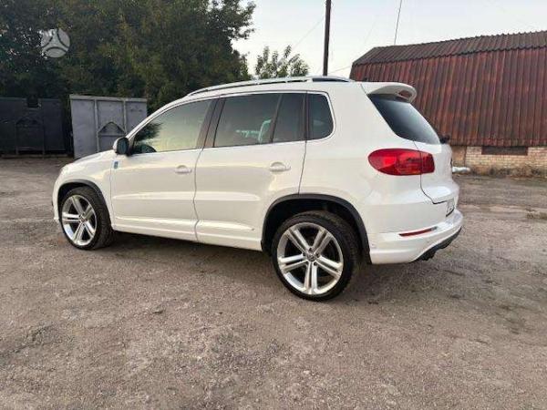 White Volkswagen Tiguan 2013 in Kaunas, with an engine capacity of 1.40 L and mileage of 290 thousand km for 6800 €, photo 2 on AUTOMOTO.COM.LV