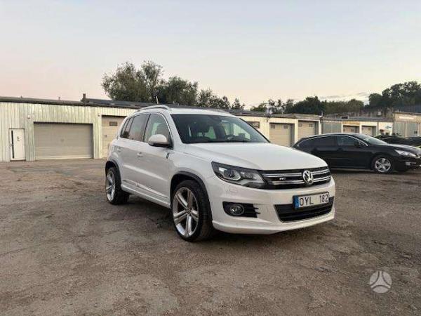 White Volkswagen Tiguan 2013 in Kaunas, with an engine capacity of 1.40 L and mileage of 290 thousand km for 6800 €, photo 5 on AUTOMOTO.COM.LV