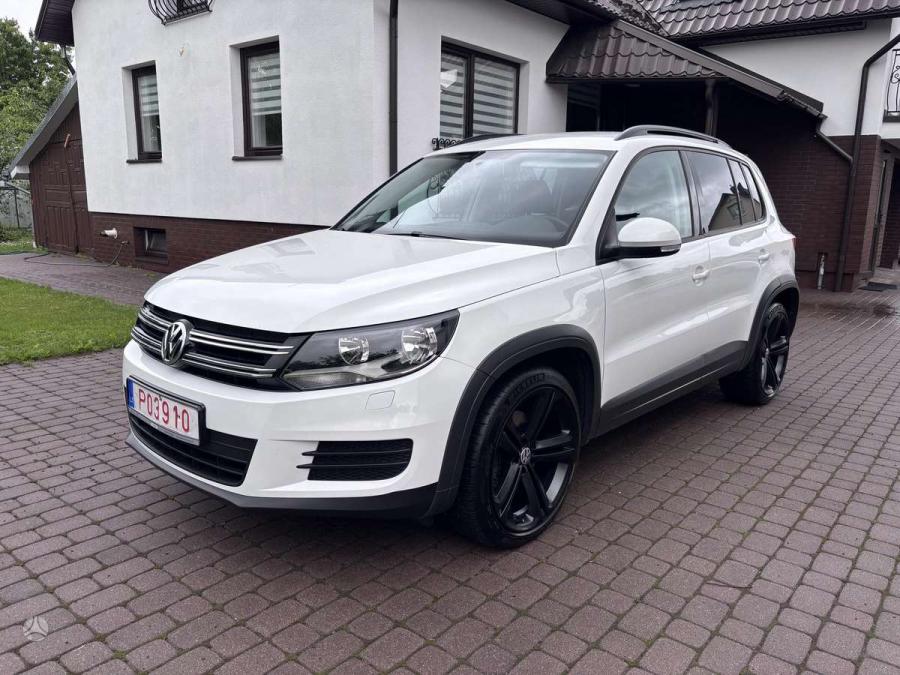 White Volkswagen Tiguan 2014 in Gargzdai, with an engine capacity of 1.40 L and mileage of 148 thousand km for 9299 €, photo 1 on AUTOMOTO.COM.LV