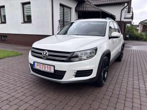 White Volkswagen Tiguan 2014 in Gargzdai, with an engine capacity of 1.40 L and mileage of 148 thousand km for 9299 €, photo 3 on AUTOMOTO.COM.LV