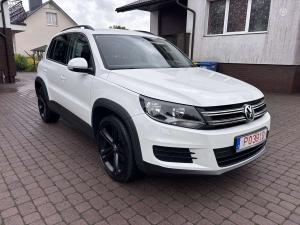 White Volkswagen Tiguan 2014 in Gargzdai, with an engine capacity of 1.40 L and mileage of 148 thousand km for 9299 €, photo 4 on AUTOMOTO.COM.LV