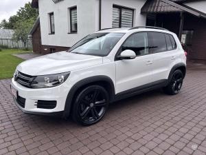 White Volkswagen Tiguan 2014 in Gargzdai, with an engine capacity of 1.40 L and mileage of 148 thousand km for 9299 €, photo 9 on AUTOMOTO.COM.LV