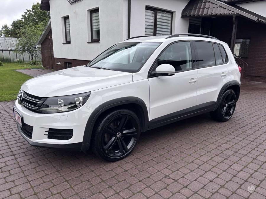 White Volkswagen Tiguan 2014 in Gargzdai, with an engine capacity of 1.40 L and mileage of 148 thousand km for 9299 €, photo 9 on AUTOMOTO.COM.LV