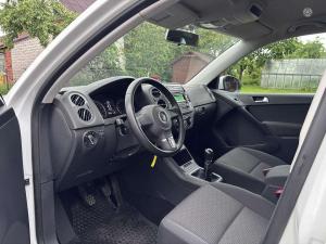 White Volkswagen Tiguan 2014 in Gargzdai, with an engine capacity of 1.40 L and mileage of 148 thousand km for 9299 €, photo 12 on AUTOMOTO.COM.LV