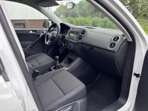White Volkswagen Tiguan 2014 in Gargzdai, with an engine capacity of 1.40 L and mileage of 148 thousand km for 9299 €, photo 16 on AUTOMOTO.COM.LV