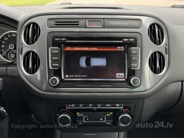 White Volkswagen Tiguan 2014 in Tartu, with an engine capacity of 2.00 L and mileage of 216 thousand km for 8900 €, photo 9 on AUTOMOTO.COM.LV