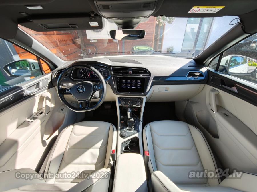 White Volkswagen Tiguan 2018 in Tallinn, with an engine capacity of 2.00 L and mileage of 260 thousand km for 17500 €, photo 12 on AUTOMOTO.COM.LV