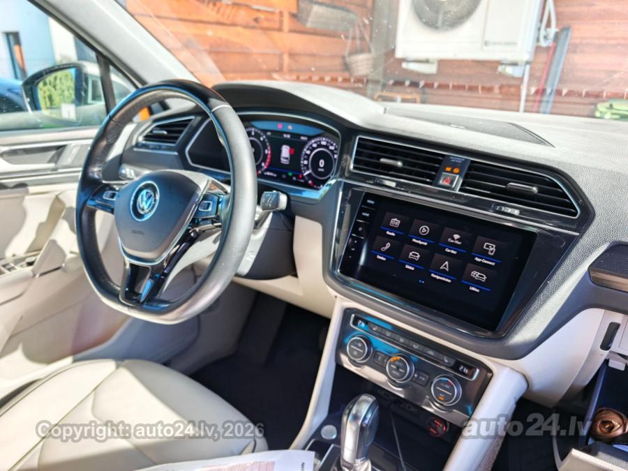 White Volkswagen Tiguan 2018 in Tallinn, with an engine capacity of 2.00 L and mileage of 260 thousand km for 17500 €, photo 13 on AUTOMOTO.COM.LV