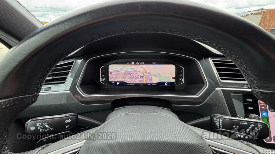 White Volkswagen Tiguan 2020 in Tallinn, with an engine capacity of 1.50 L and mileage of 77 thousand km for 23999 €, photo 7 on AUTOMOTO.COM.LV