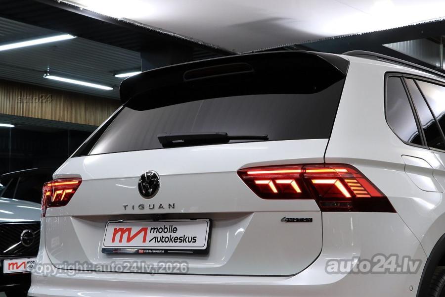 White Volkswagen Tiguan 2024 in Tallinn, with an engine capacity of 2.00 L and mileage of 57 thousand km for 35995 €, photo 29 on AUTOMOTO.COM.LV