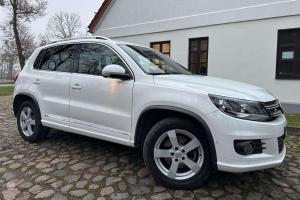 Yellow Volkswagen Tiguan 2012 in Kaunas, with an engine capacity of 1.97 L and mileage of 230 thousand km for 9990 €, photo 2 on AUTOMOTO.COM.LV