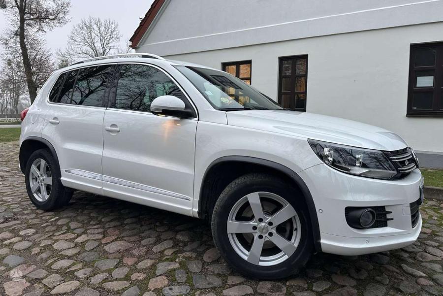 Yellow Volkswagen Tiguan 2012 in Kaunas, with an engine capacity of 1.97 L and mileage of 230 thousand km for 9990 €, photo 2 on AUTOMOTO.COM.LV