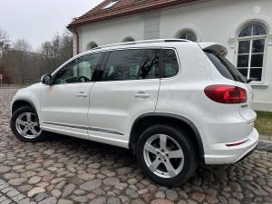 Yellow Volkswagen Tiguan 2012 in Kaunas, with an engine capacity of 1.97 L and mileage of 230 thousand km for 9990 €, photo 4 on AUTOMOTO.COM.LV