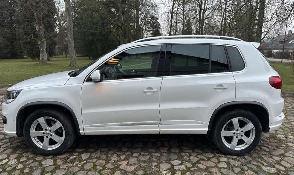 Yellow Volkswagen Tiguan 2012 in Kaunas, with an engine capacity of 1.97 L and mileage of 230 thousand km for 9990 €, photo 5 on AUTOMOTO.COM.LV