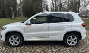 Yellow Volkswagen Tiguan 2012 in Kaunas, with an engine capacity of 1.97 L and mileage of 230 thousand km for 9990 €, photo 5 on AUTOMOTO.COM.LV