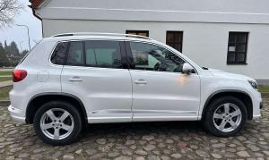 Yellow Volkswagen Tiguan 2012 in Kaunas, with an engine capacity of 1.97 L and mileage of 230 thousand km for 9990 €, photo 6 on AUTOMOTO.COM.LV