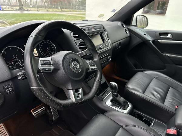 Yellow Volkswagen Tiguan 2012 in Kaunas, with an engine capacity of 1.97 L and mileage of 230 thousand km for 9990 €, photo 8 on AUTOMOTO.COM.LV