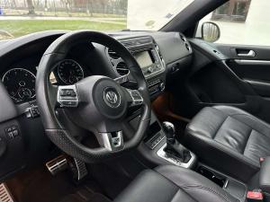 Yellow Volkswagen Tiguan 2012 in Kaunas, with an engine capacity of 1.97 L and mileage of 230 thousand km for 9990 €, photo 8 on AUTOMOTO.COM.LV