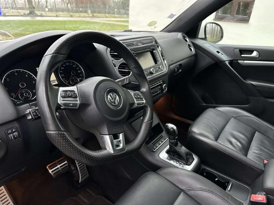 Yellow Volkswagen Tiguan 2012 in Kaunas, with an engine capacity of 1.97 L and mileage of 230 thousand km for 9990 €, photo 8 on AUTOMOTO.COM.LV