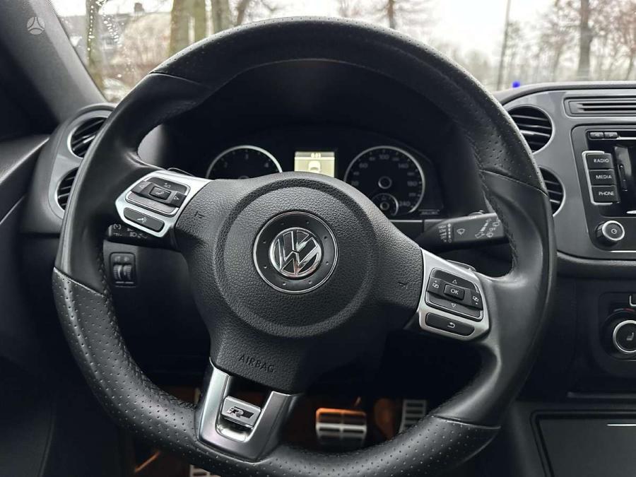 Yellow Volkswagen Tiguan 2012 in Kaunas, with an engine capacity of 1.97 L and mileage of 230 thousand km for 9990 €, photo 18 on AUTOMOTO.COM.LV