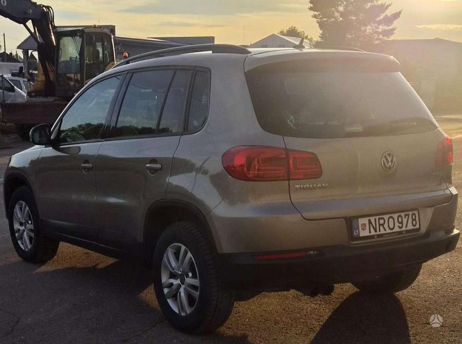 Yellow Volkswagen Tiguan 2013 in Radviliskis, with an engine capacity of 1.97 L and mileage of 320 thousand km for 8000 €, photo 6 on AUTOMOTO.COM.LV