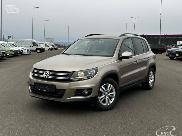 Yellow Volkswagen Tiguan 2015 in Avizieniai, with an engine capacity of 1.40 L and mileage of 48 thousand km for 10900 €, photo 1 on AUTOMOTO.COM.LV