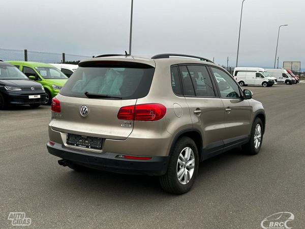 Yellow Volkswagen Tiguan 2015 in Avizieniai, with an engine capacity of 1.40 L and mileage of 48 thousand km for 10900 €, photo 2 on AUTOMOTO.COM.LV