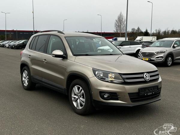 Yellow Volkswagen Tiguan 2015 in Avizieniai, with an engine capacity of 1.40 L and mileage of 48 thousand km for 10900 €, photo 3 on AUTOMOTO.COM.LV