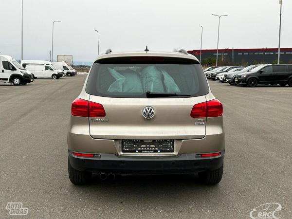 Yellow Volkswagen Tiguan 2015 in Avizieniai, with an engine capacity of 1.40 L and mileage of 48 thousand km for 10900 €, photo 6 on AUTOMOTO.COM.LV
