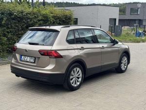 Yellow Volkswagen Tiguan 2017 in Kaunas, with an engine capacity of 1.40 L and mileage of 189 thousand km for 15990 €, photo  on AUTOMOTO.COM.LV