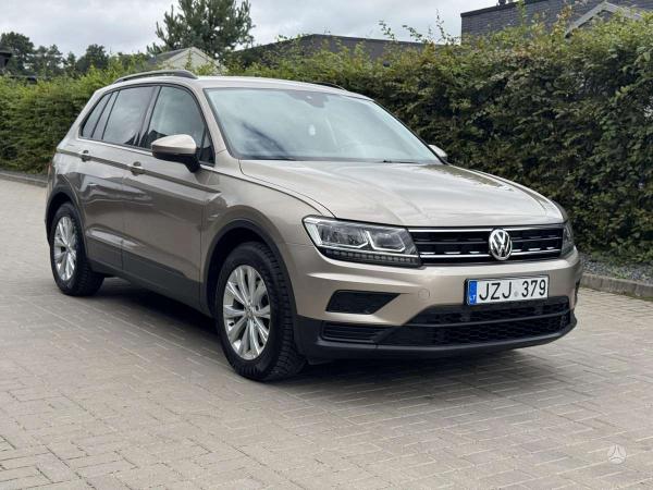 Yellow Volkswagen Tiguan 2017 in Kaunas, with an engine capacity of 1.40 L and mileage of 189 thousand km for 15990 €, photo 5 on AUTOMOTO.COM.LV