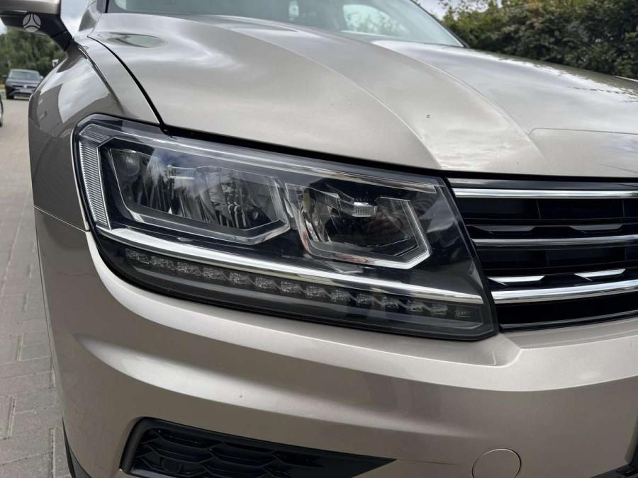 Yellow Volkswagen Tiguan 2017 in Kaunas, with an engine capacity of 1.40 L and mileage of 189 thousand km for 15990 €, photo 11 on AUTOMOTO.COM.LV