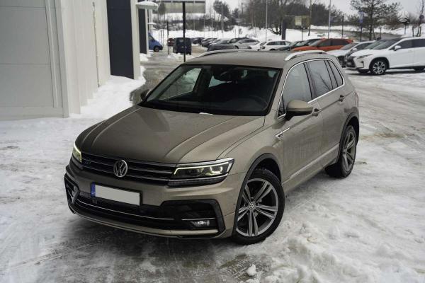 Yellow Volkswagen Tiguan 2018 in Vilnius, with an engine capacity of 1.97 L and mileage of 135 thousand km for 23100 €, photo 1 on AUTOMOTO.COM.LV