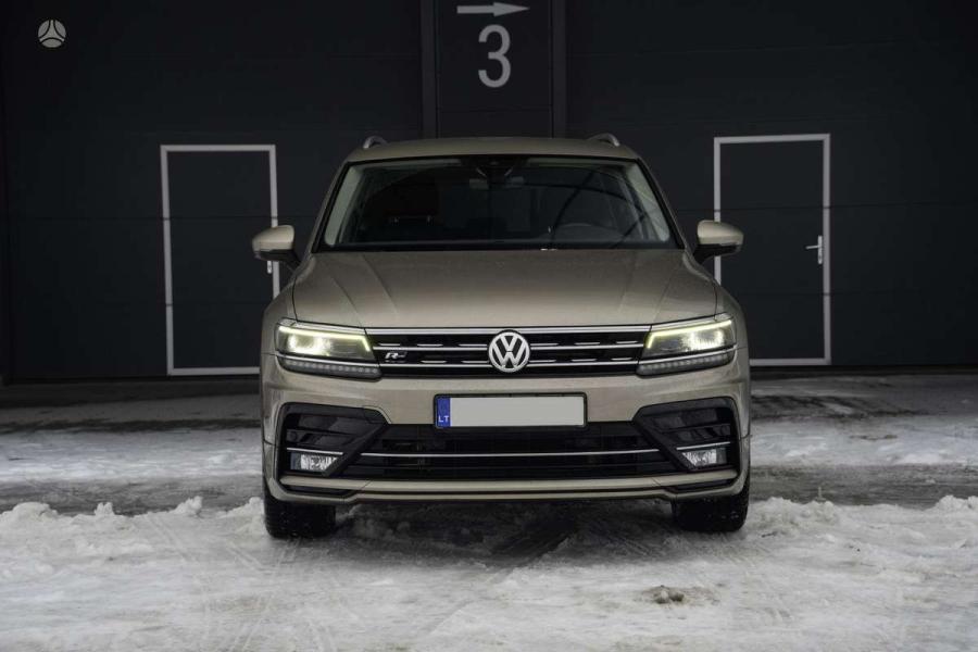 Yellow Volkswagen Tiguan 2018 in Vilnius, with an engine capacity of 1.97 L and mileage of 135 thousand km for 23100 €, photo 2 on AUTOMOTO.COM.LV